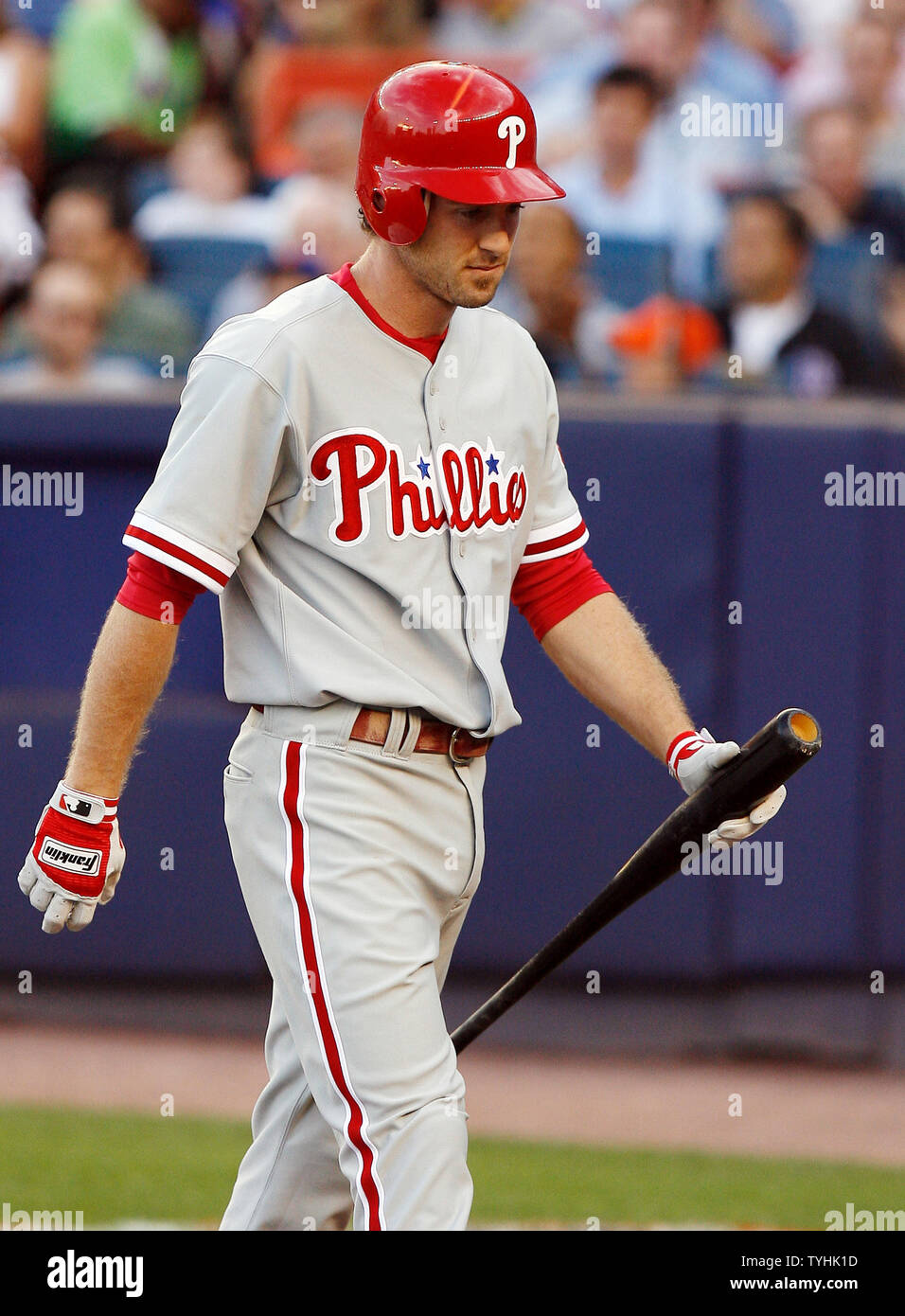 Philadelphia Phillies Chase Utley looks down while walking to the dug ...