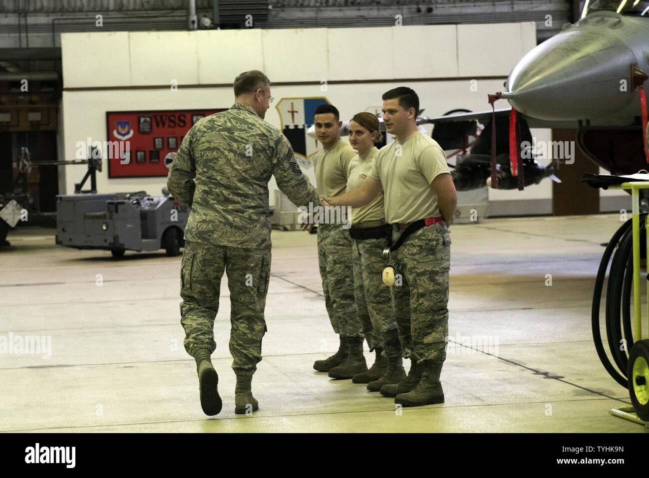 U.S. Air Force Chief Master Sgt. Craig Brandenburg, left, 52nd ...
