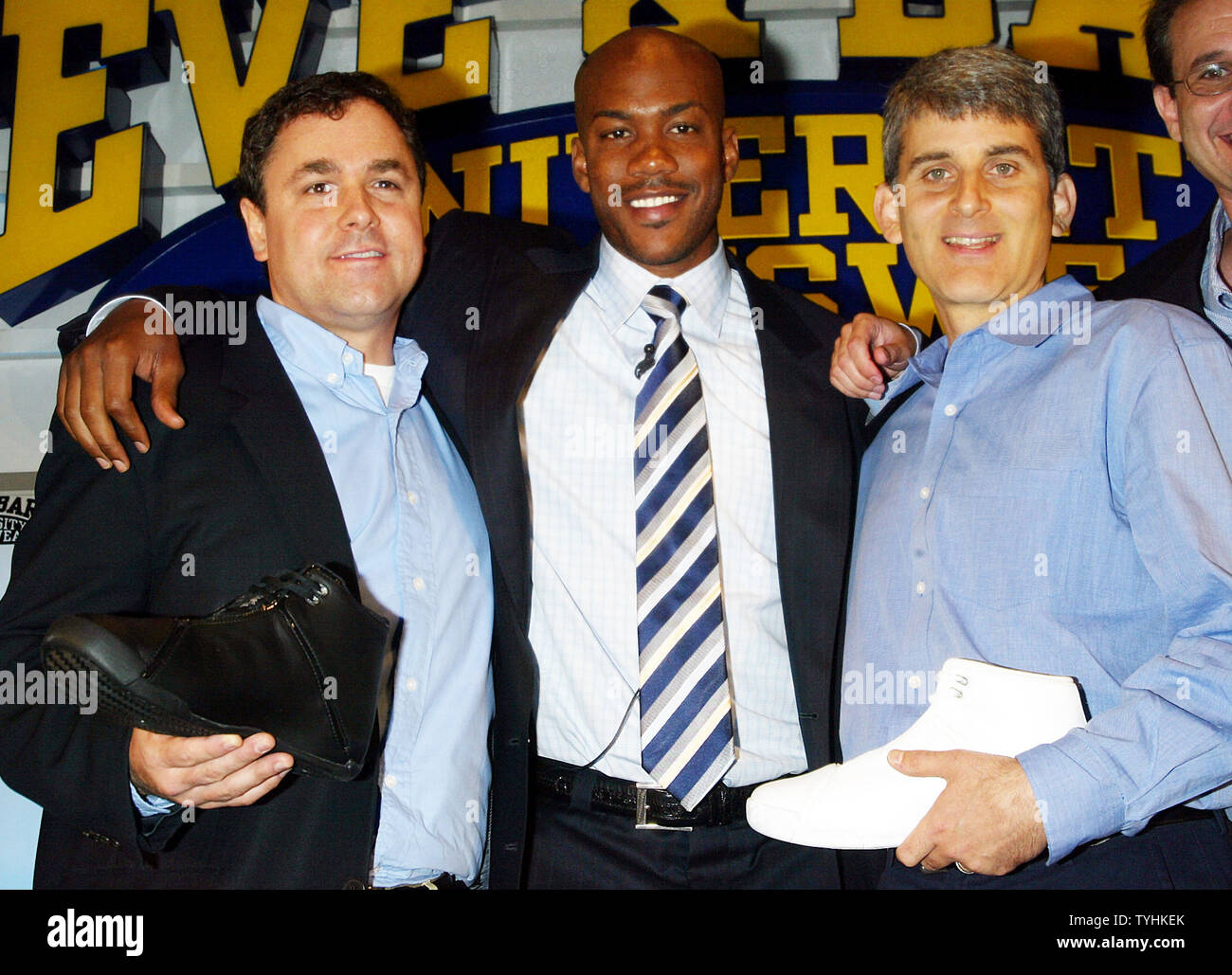 New York Knicks basketball star Stephon Marbury (center) poses for ...