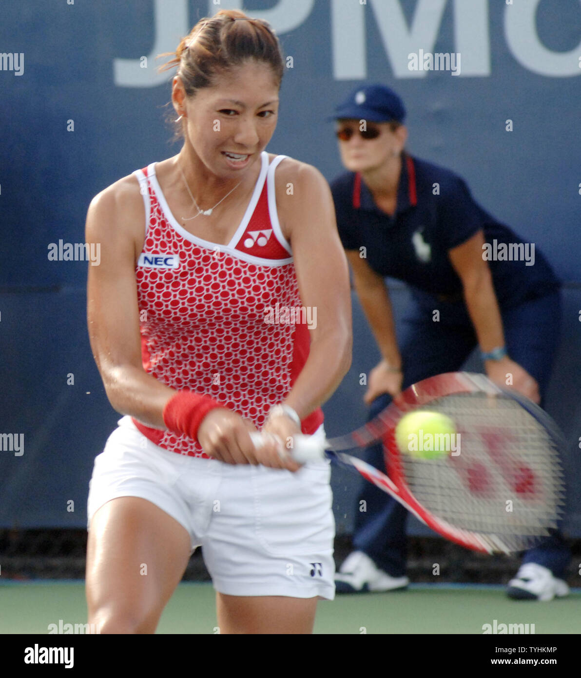 Shinobu Asagoe (Japan) reacts during her first round match against ...