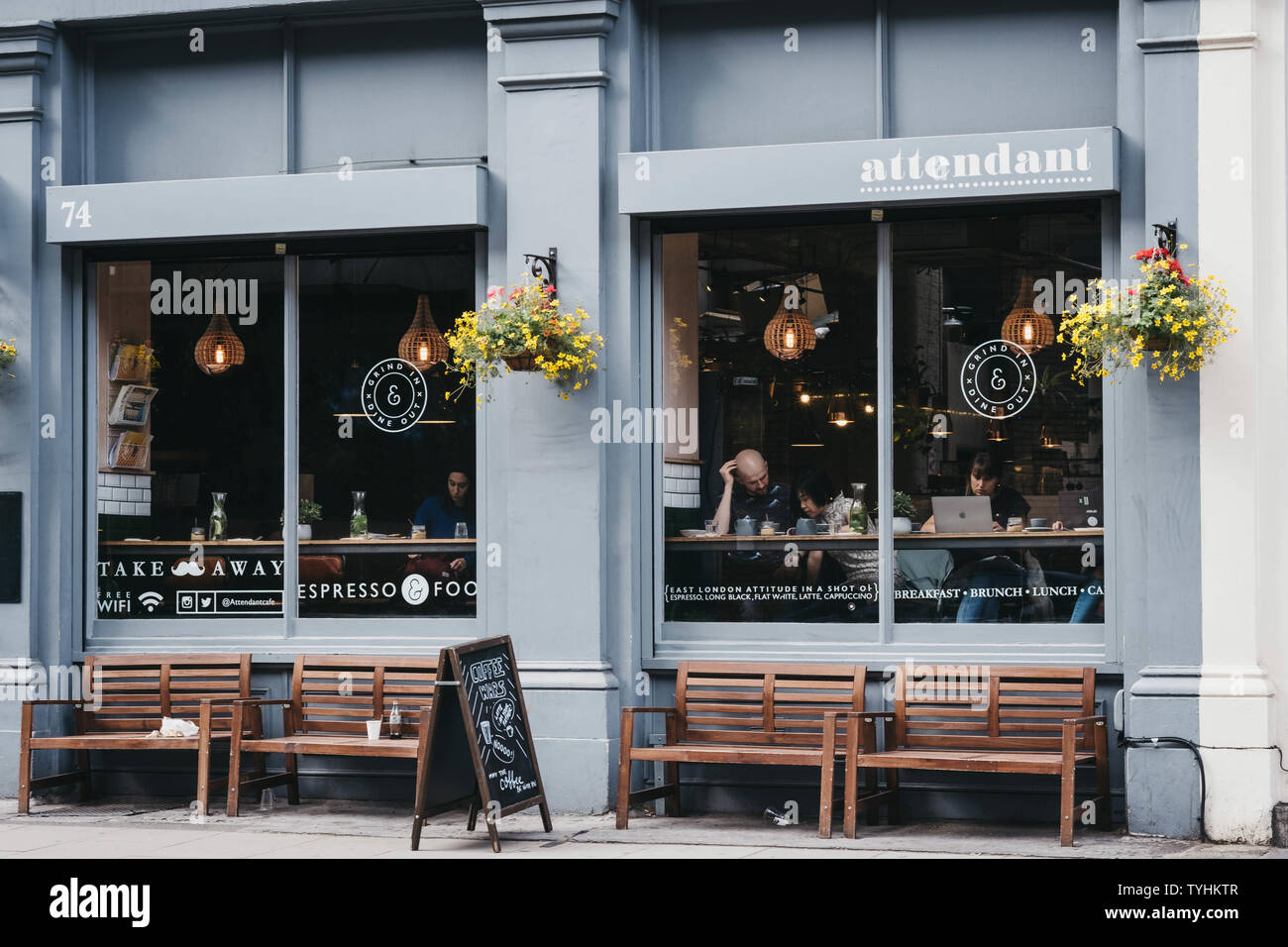 London, UK - June 15, 2019: View through the window of people inside ...