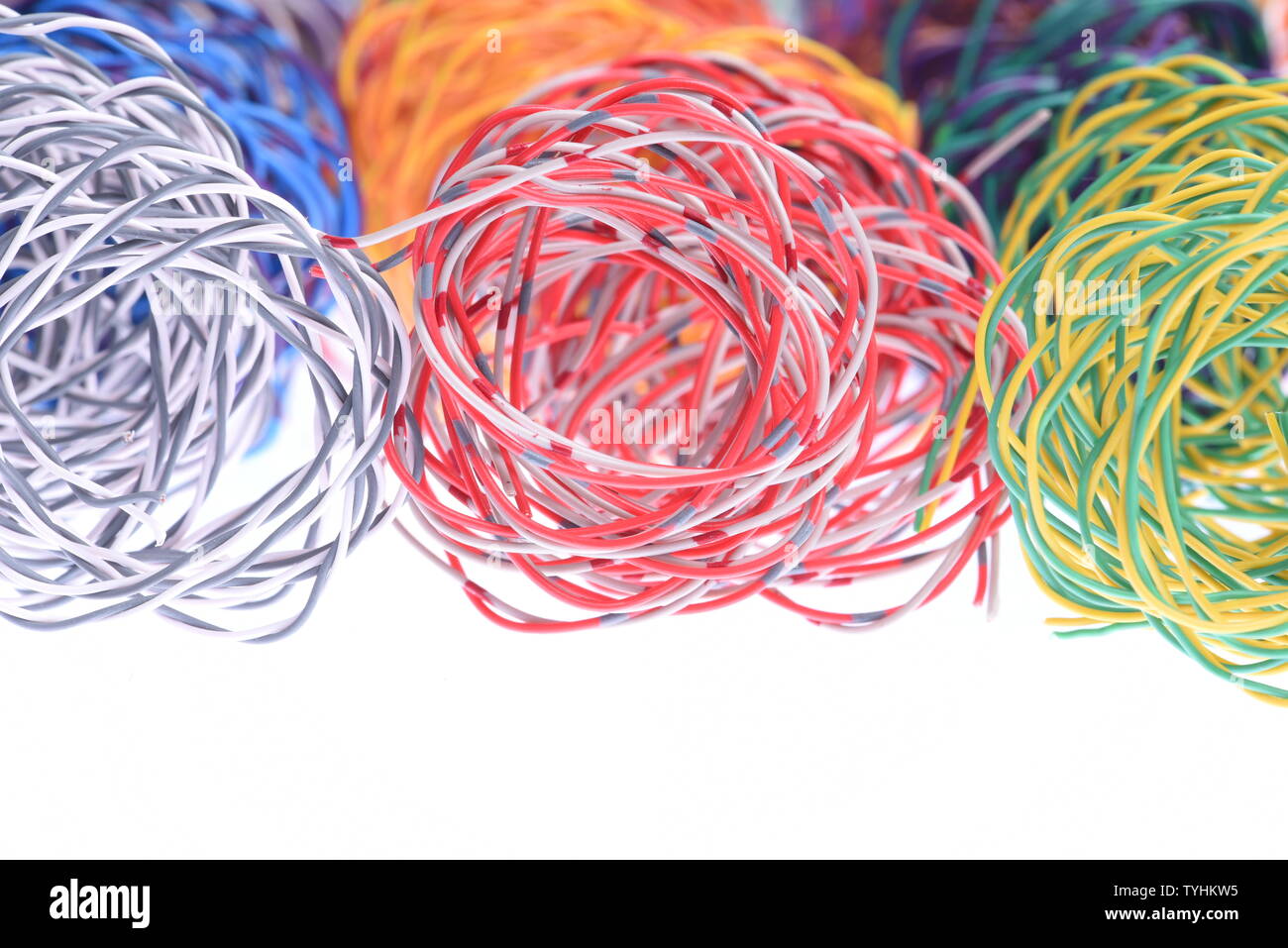 Scrap colorful cable wire isolated on white background Stock Photo - Alamy