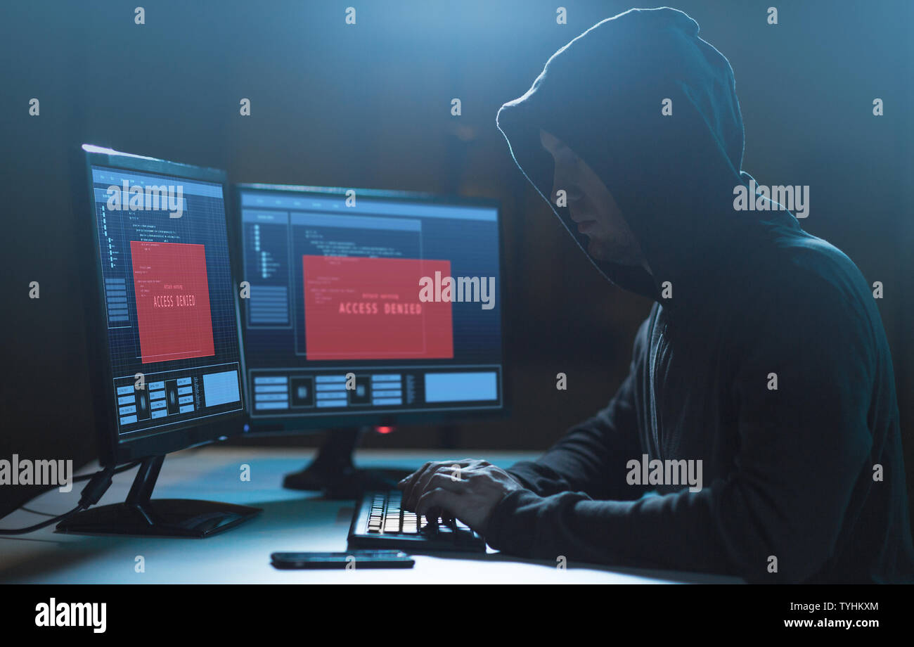 hacker with access denied messages on computer Stock Photo - Alamy