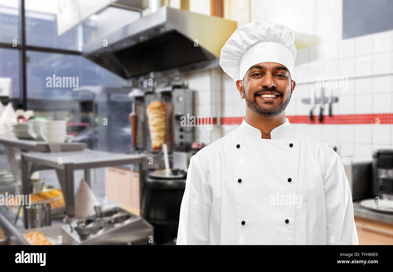 happy male indian chef in toque at kebab shop Stock Photo - Alamy