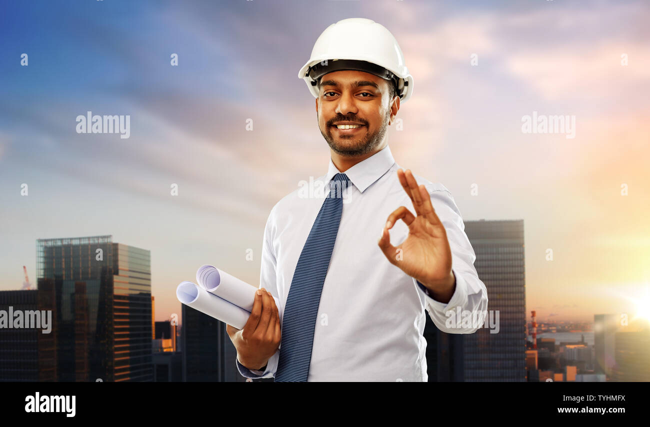 architect with blueprints showing ok in tokyo Stock Photo - Alamy