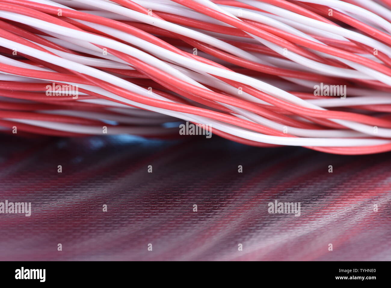 Colorful telecommunication cables on metallic surface with reflection ...