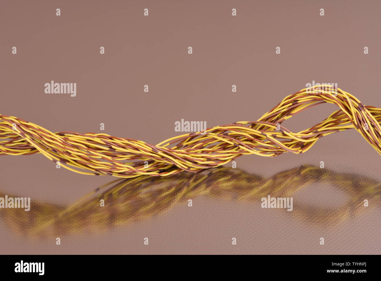 Colorful electrical telecommunication cables on metallic surface with ...