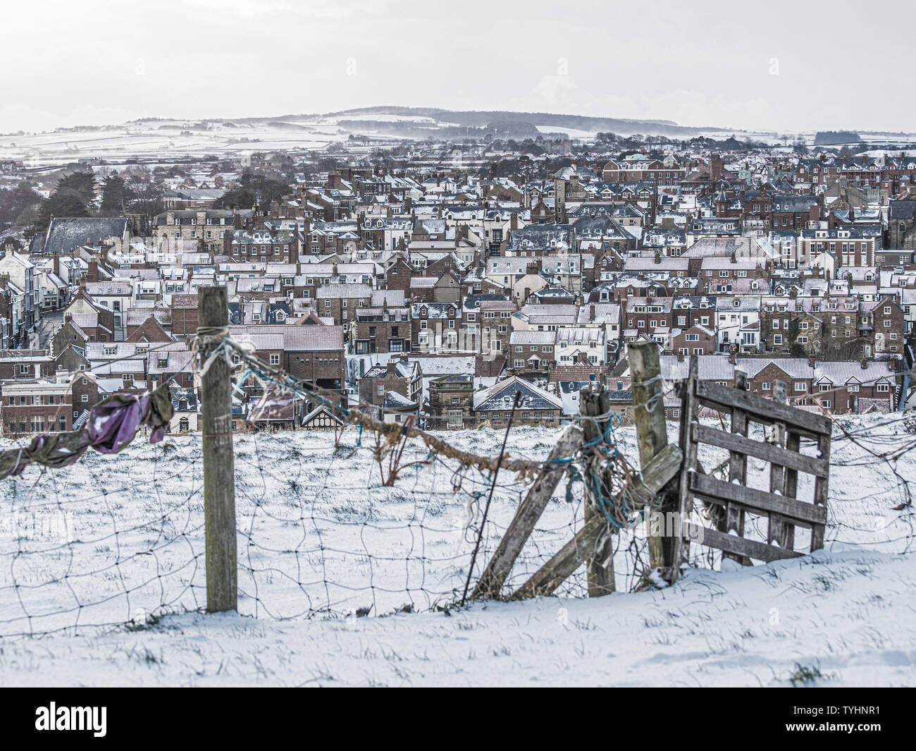 View of Whitby town centre in snow from St Mary's Church. Whitby, North ...
