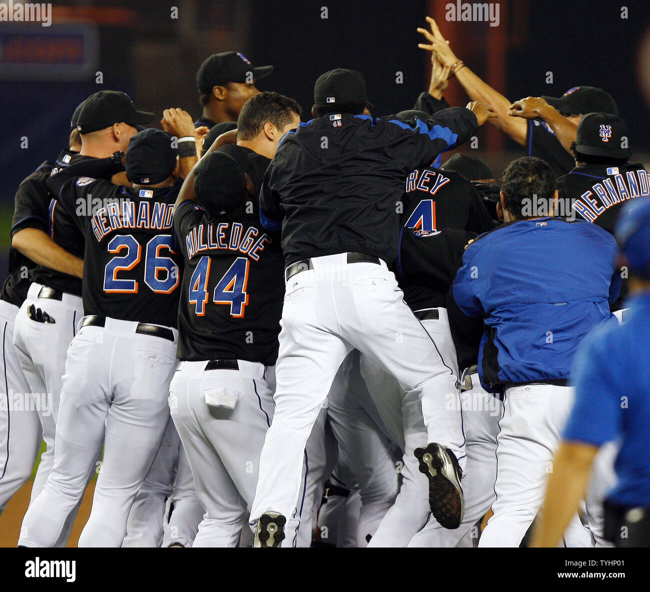 The New York Mets celebrate on the field at Shea Stadium in New York ...