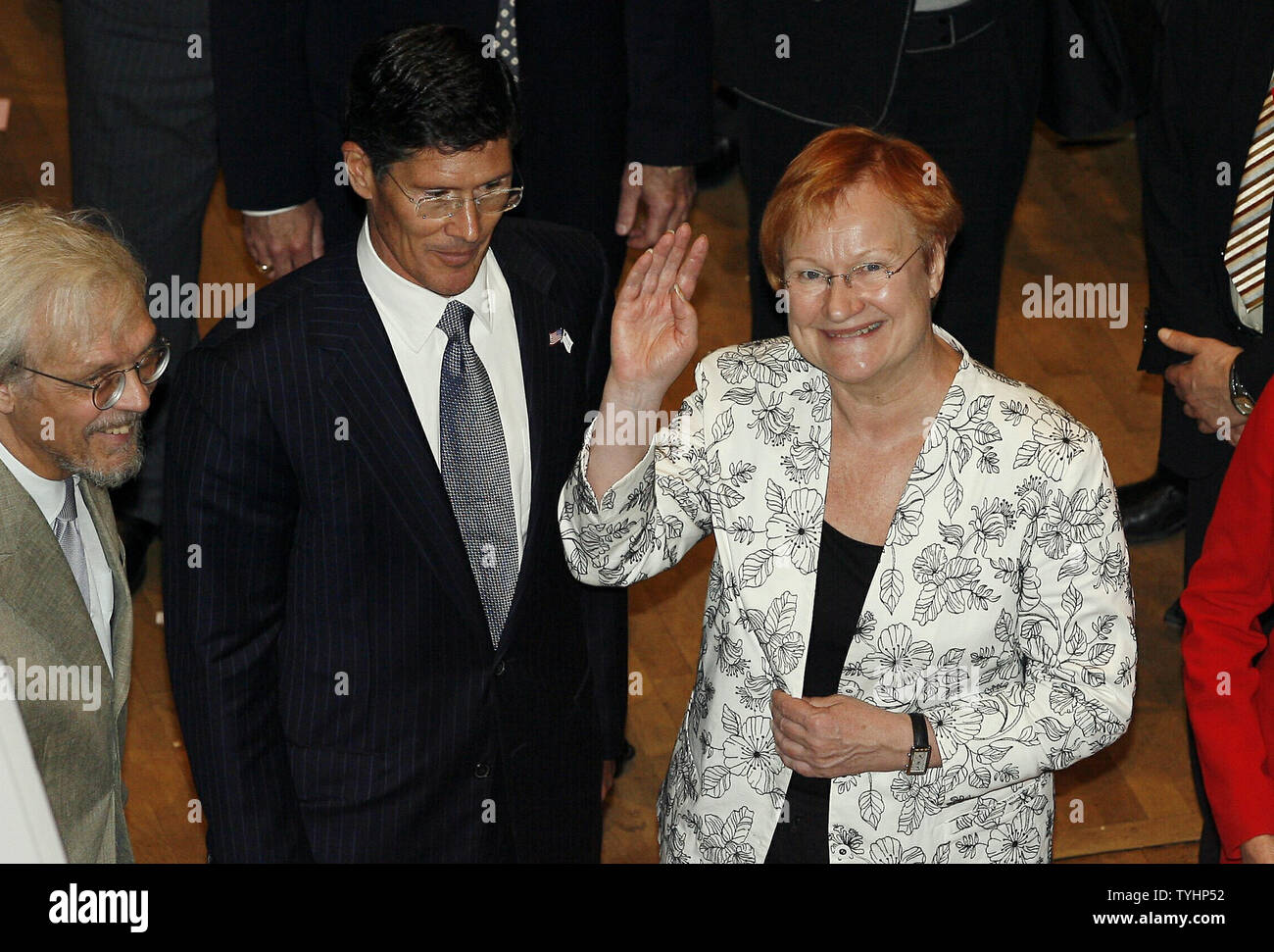 President of Finland H.E. Tarja Kaarina Halonen and NYSE CEO John Thain ...