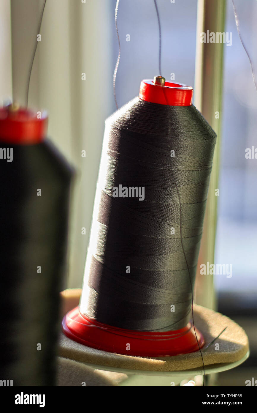 Fabric bobbin hi-res stock photography and images - Alamy