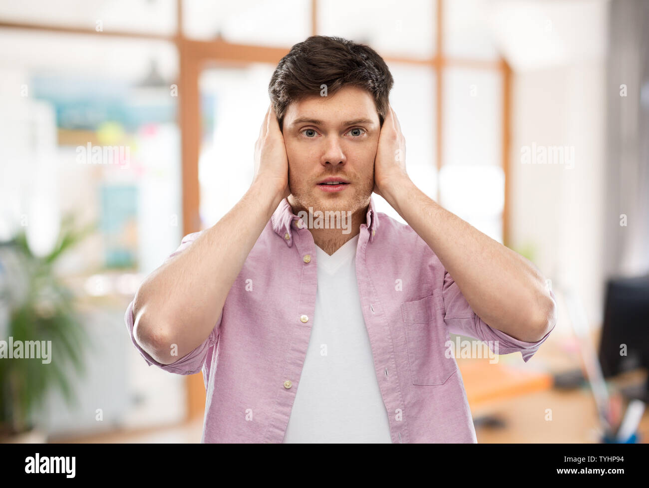 Hands over ears loud hi-res stock photography and images - Alamy
