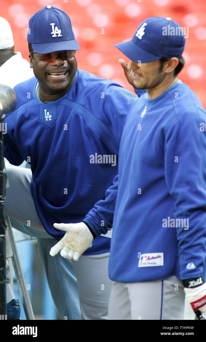Los Angeles' Eddy Murry, left, kids with Nomar Garciaparra during a ...