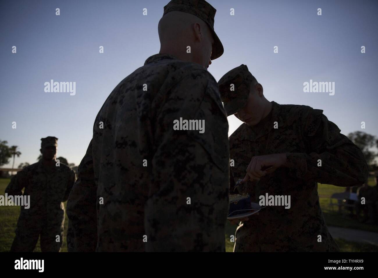 U.S. Marine Corps Private First Class Cory C. Neimeister, left, a field ...