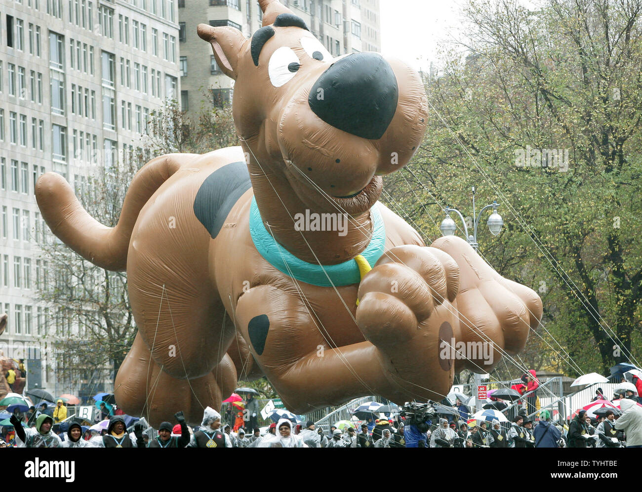 A gust of wind knocks around the Scooby Doo float as it is passes ...