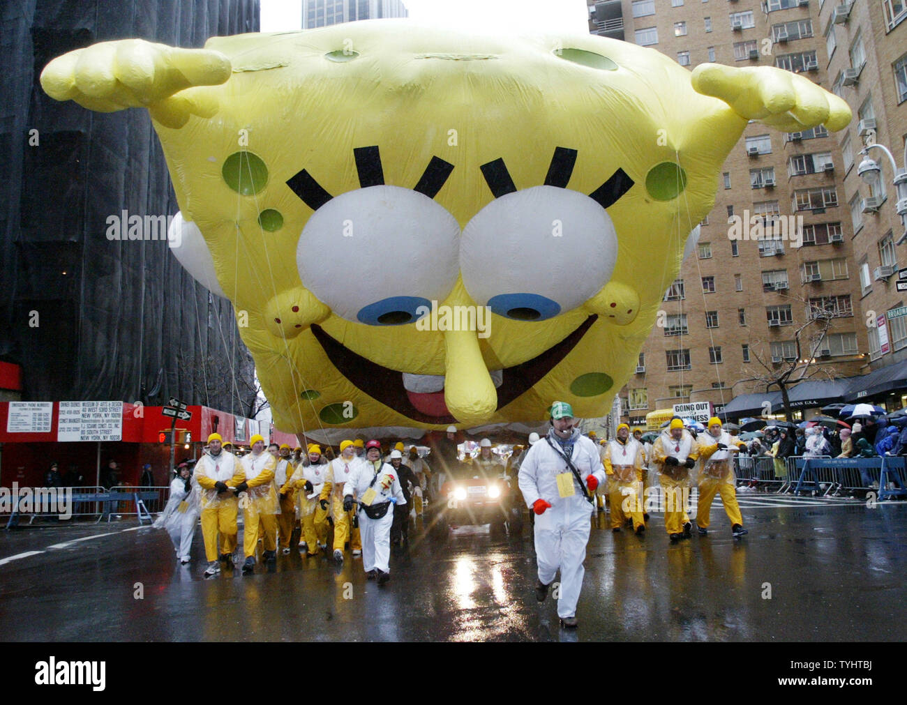 Float handlers guide the SpongeBob SquarePants float down Broadway ...