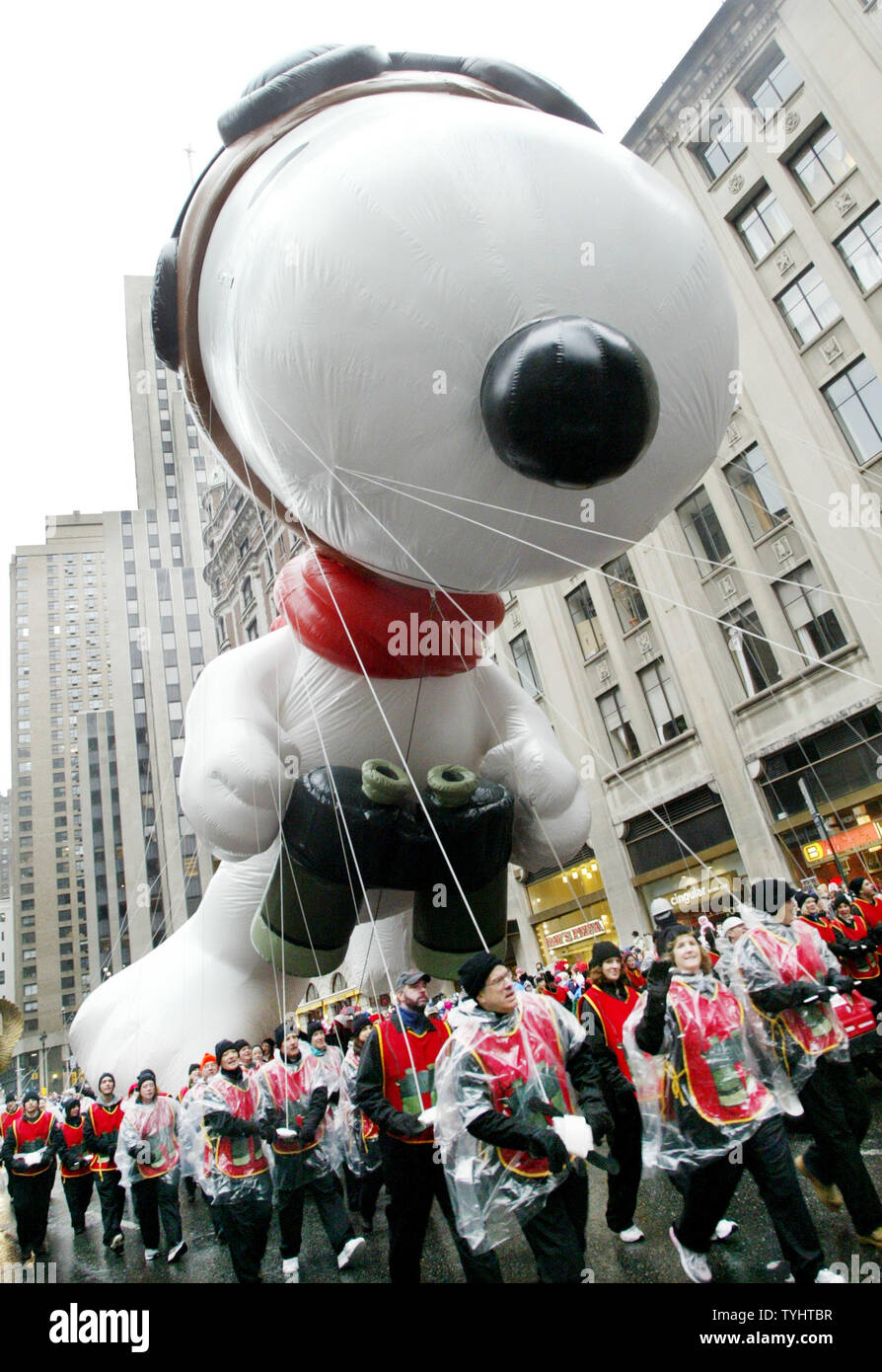 The new Flying Ace Snoopy float is lead down Broadway despite the gusty ...