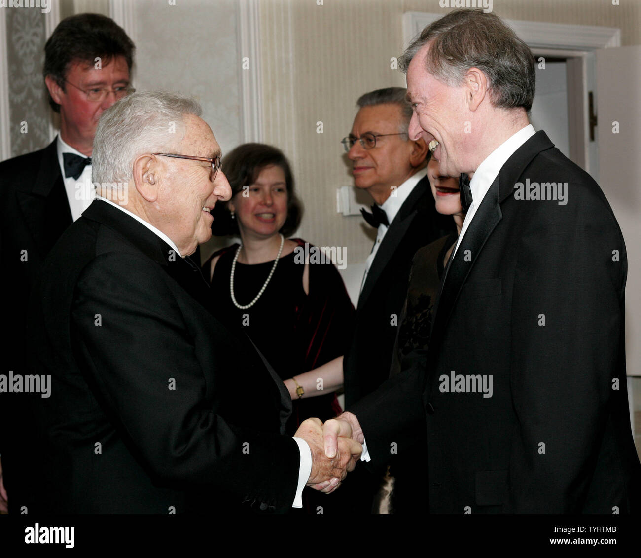 Former Secretary of State Henry Kissinger, left, meets Germany's ...