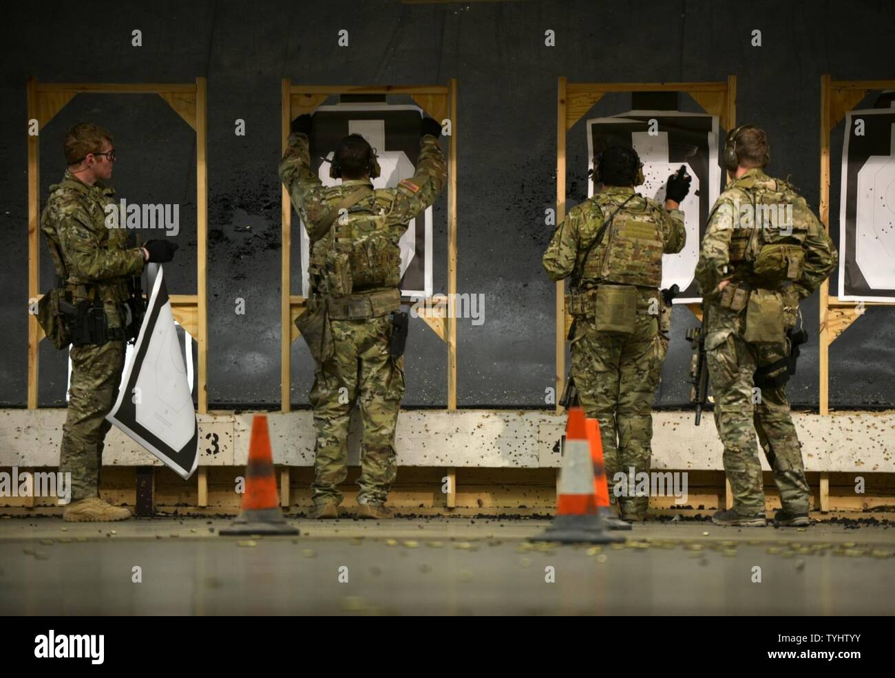 U.S. Soldiers assigned to 1-10th Special Forces Group inspect their ...