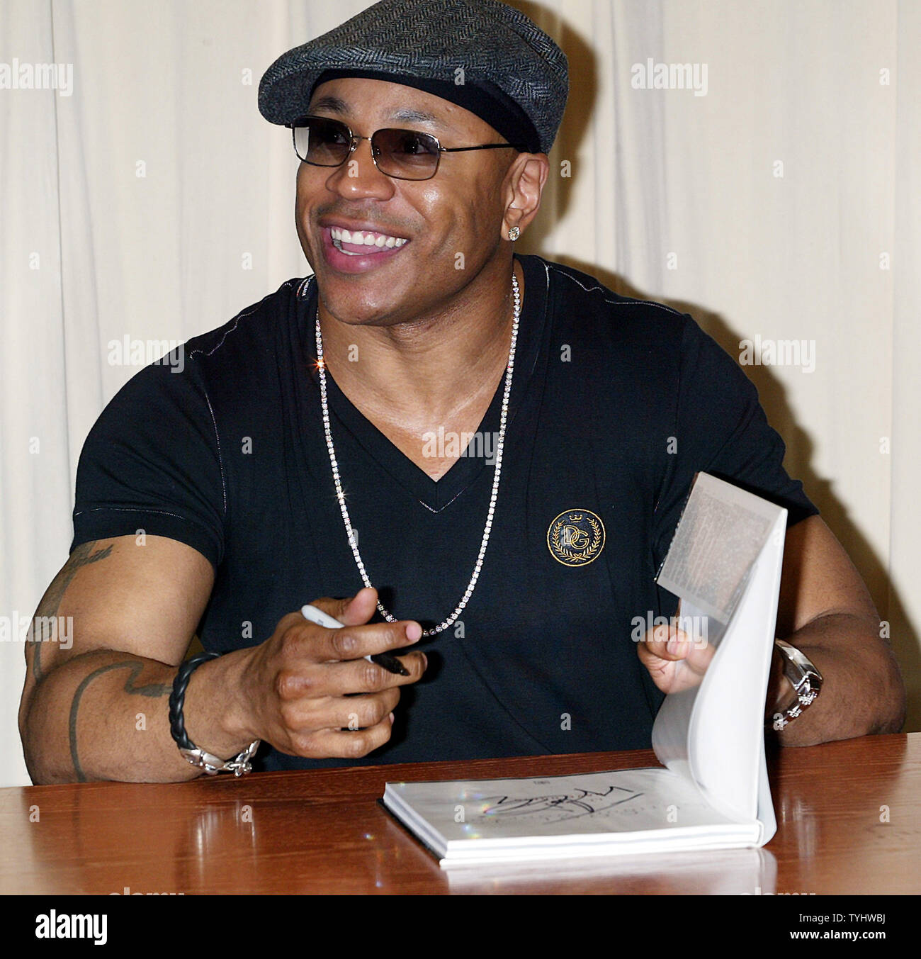 LL Cool J signs copies of his new book "LL Cool J's Platinum Workout ...