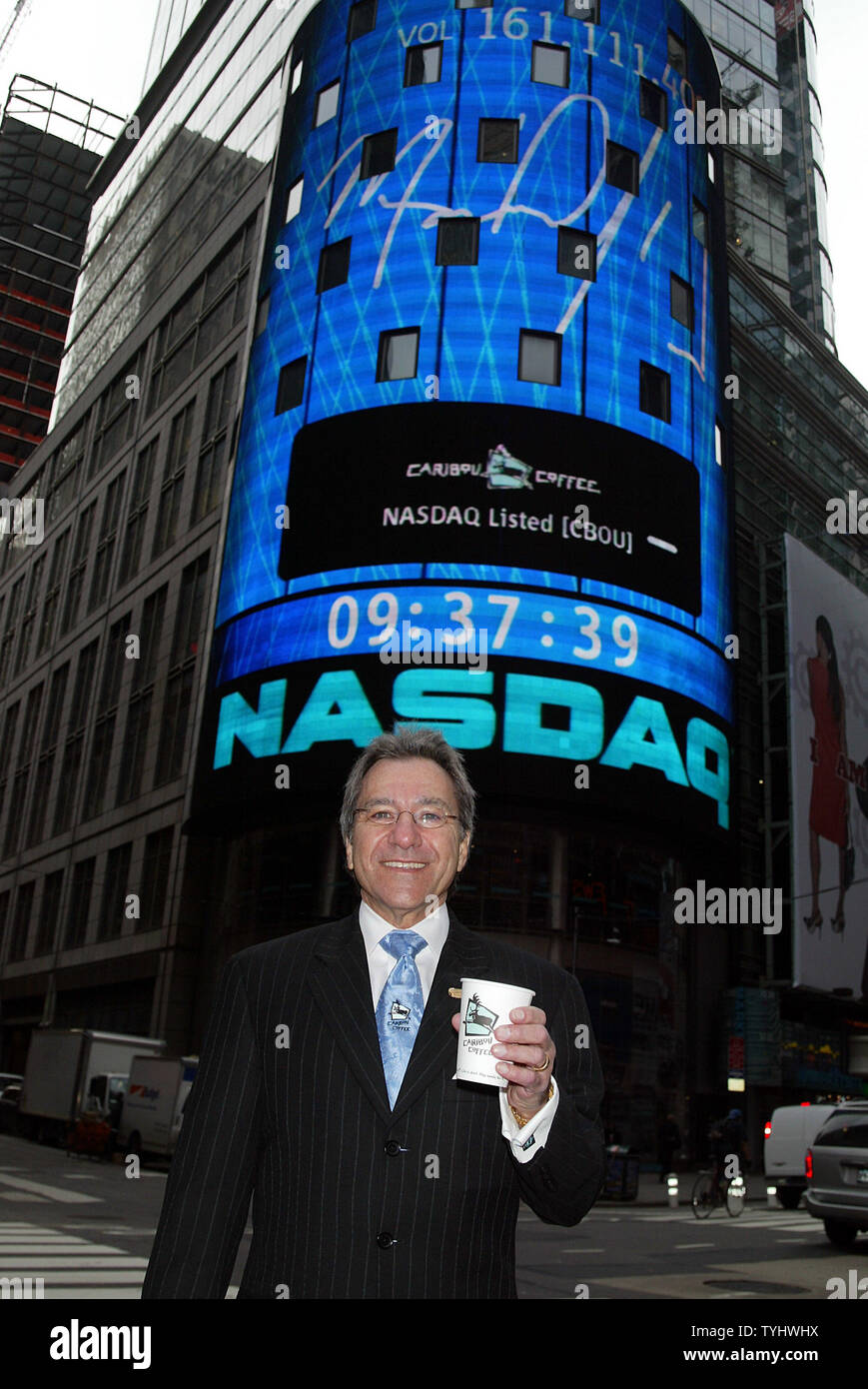 Michael Cole, CEO of Caribou Coffee, stands outside the NASDAQ after ...