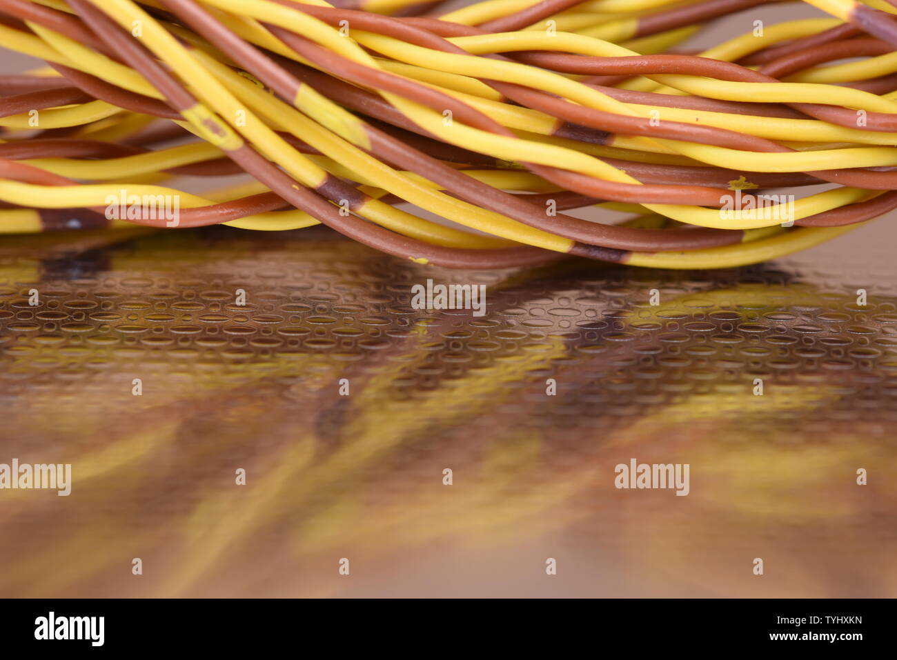 Colorful electrical telecommunication cables on metallic surface with ...