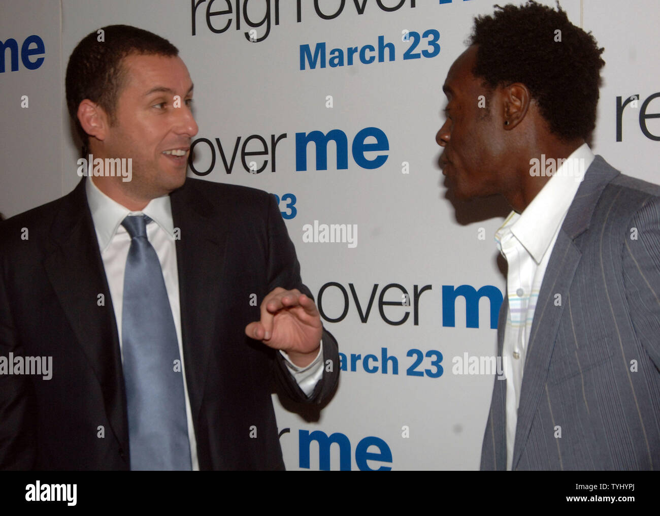 Actors Adam Sandler and Don Cheadle (R) arrive at the premiere of their ...
