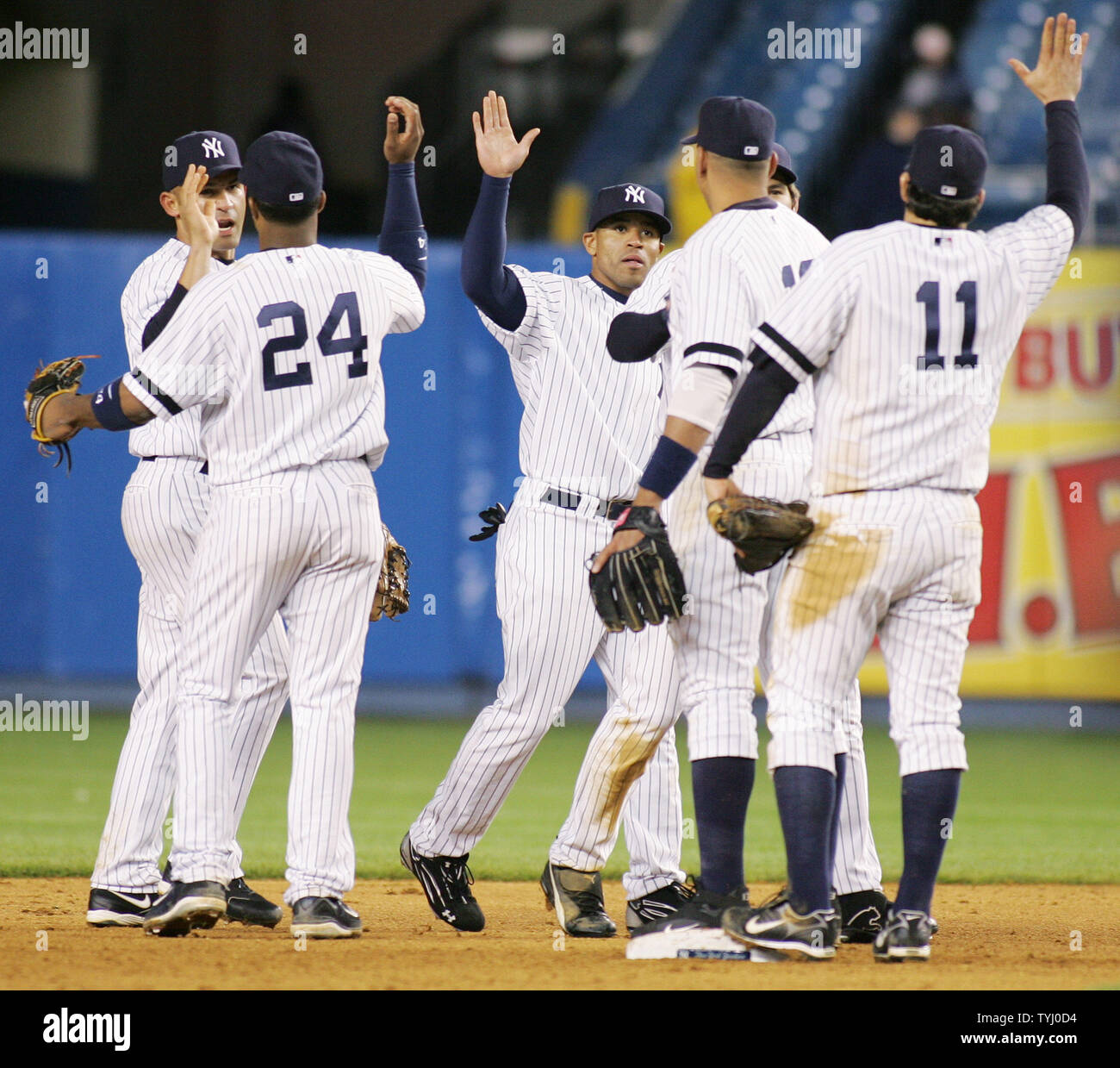 New York Yankees celebrate after beating the Cleveland Indians 10-3 at ...