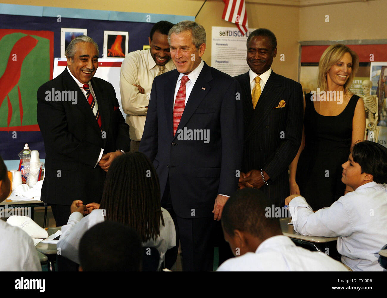 (L-R) Charles Rangel, Emmanuel George, U.S. President George W. Bush ...