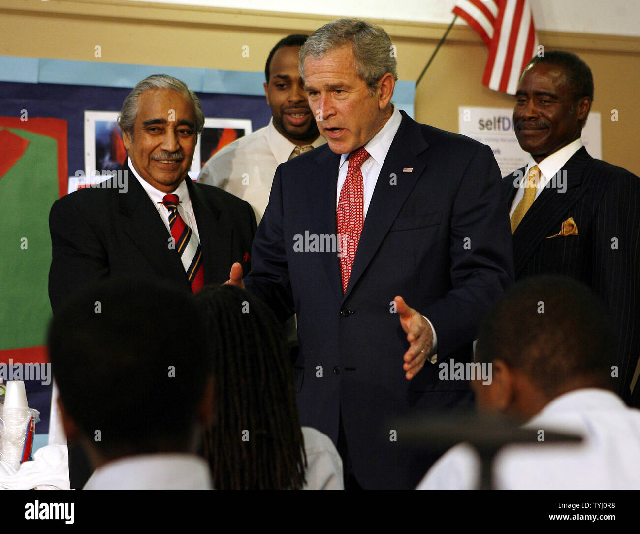 (L-R) Charles Rangel, Emmanuel George, U.S. President George W. Bush ...