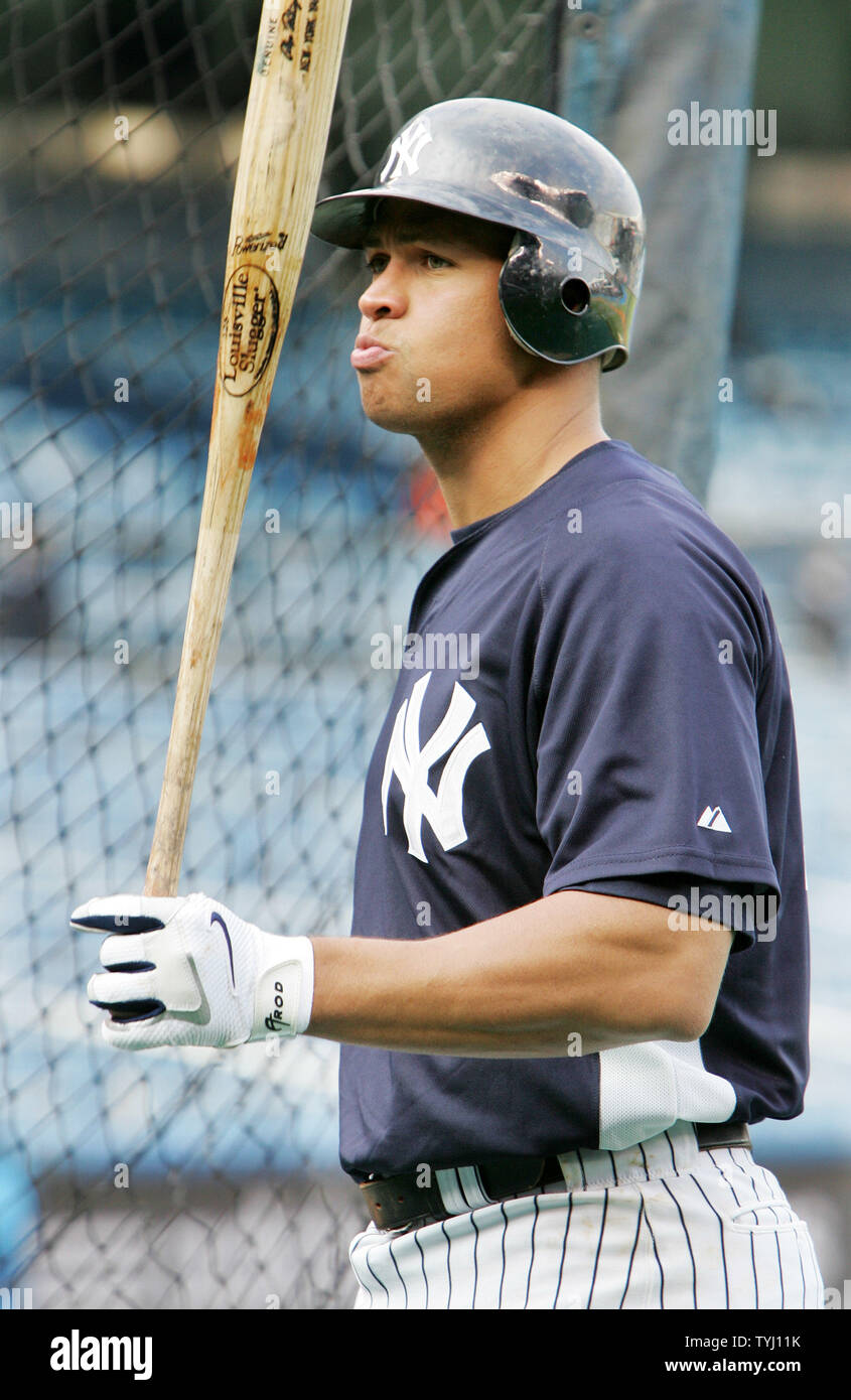 Alex Rodriguez, third baseman for the New York Yankees, warms up during ...