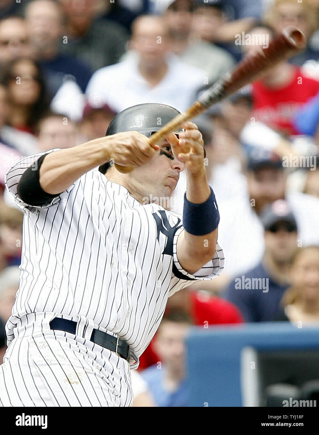 New York Yankees Doug Mientkiewicz watches the ball fly after hitting a ...
