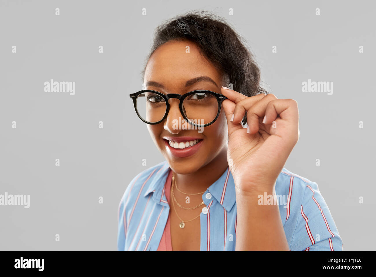 African student in eyeglasses hi-res stock photography and images - Alamy