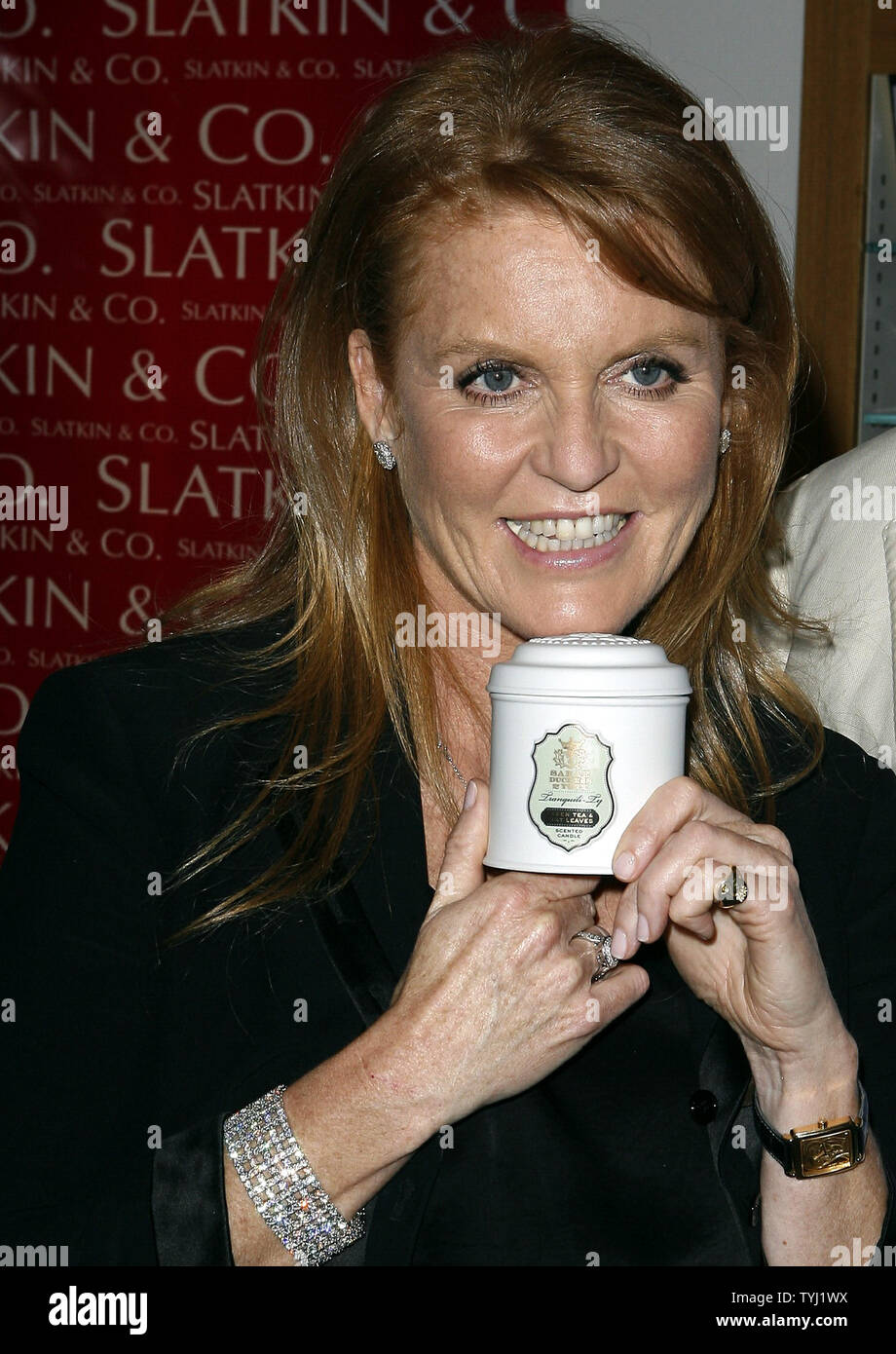 Sarah Ferguson, Duchess of York, holds a candle while celebrating the ...