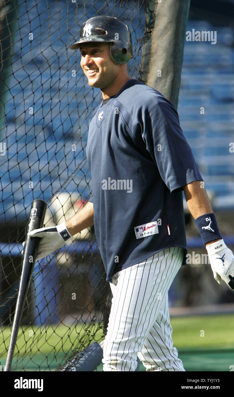New York Yankees' shortstop Derek Jeter smiles during batting practice ...