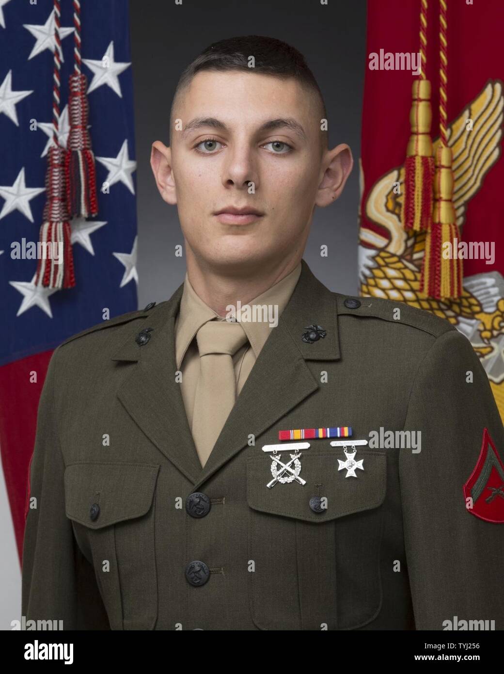 Lance Corporal J.M. Soto poses for a command portrait after he wins ...