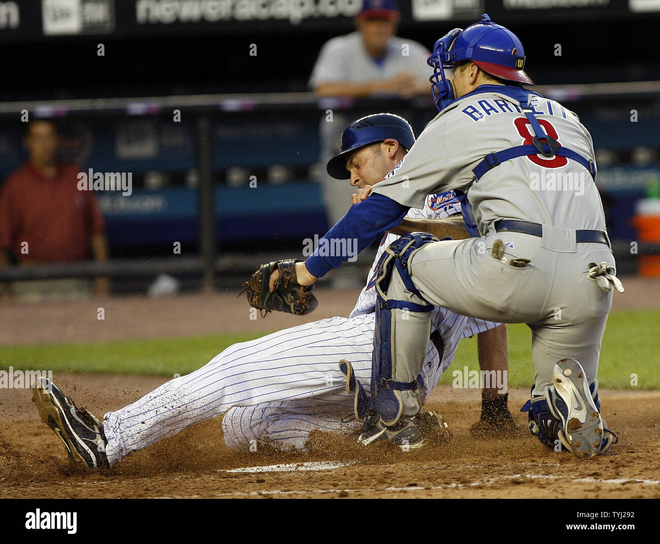 New York Mets Shawn Green slides into home and is tagged out by Chicago ...