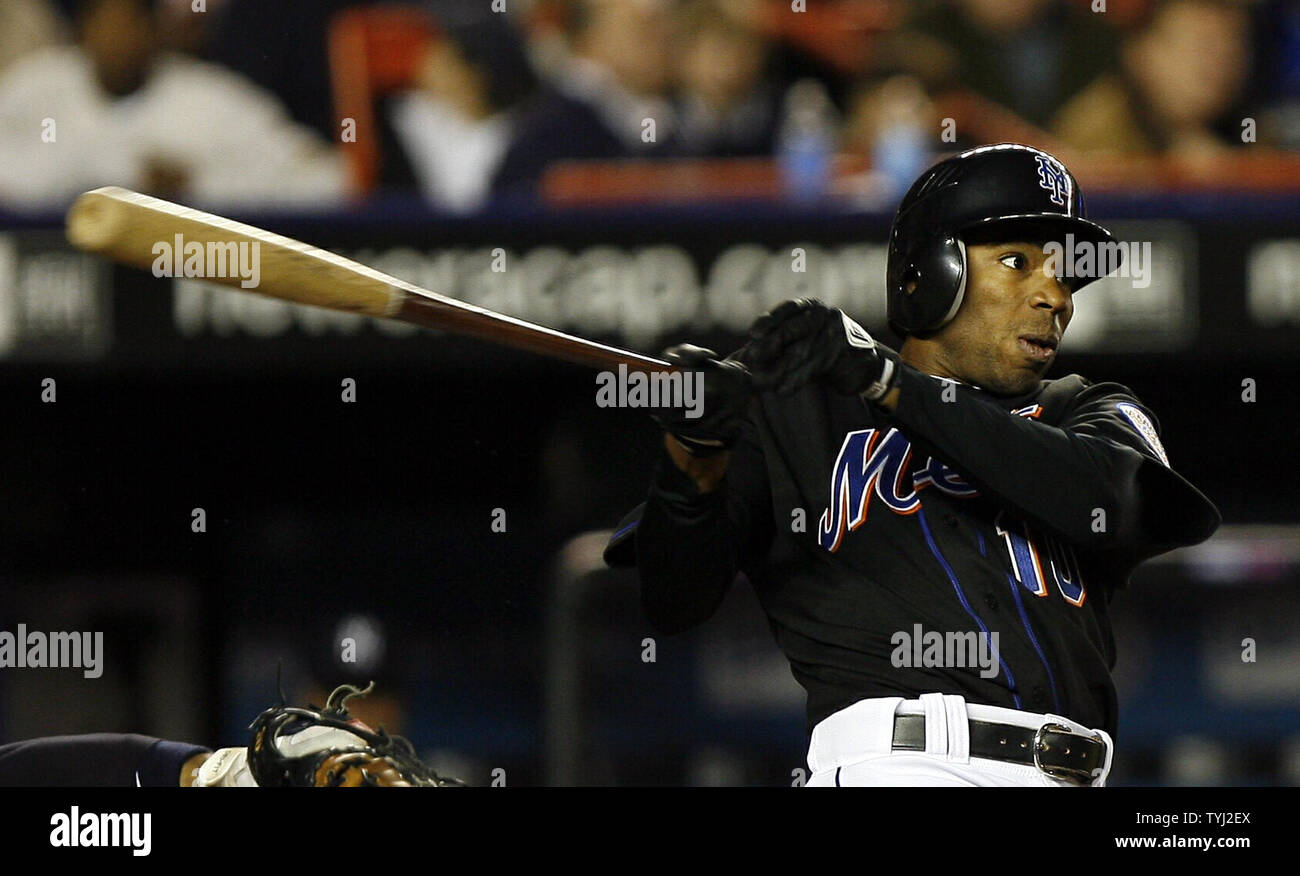 New York Mets Endy Chavez watches the ball after hitting a 2 run homer ...