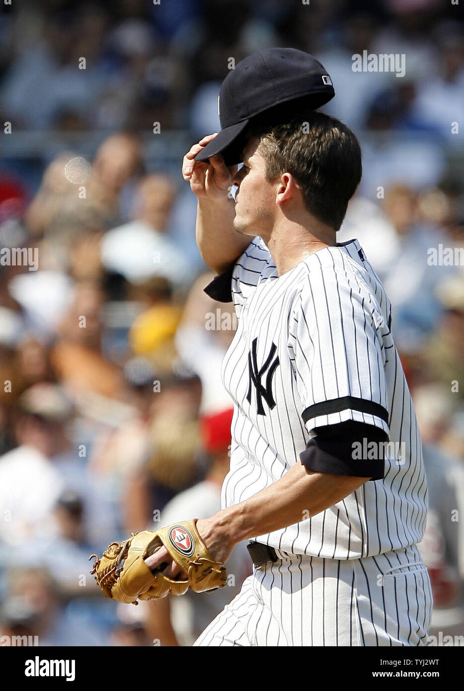 New York Yankees Scott Proctor reacts after walking in a run in the 7th ...