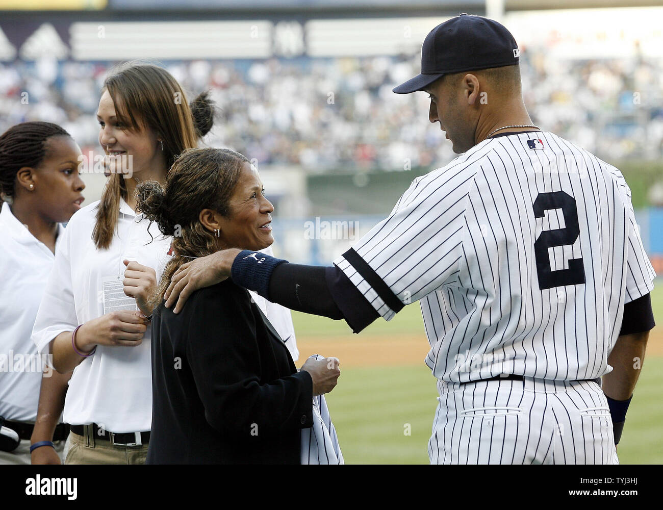 New York Yankees Derek Jeter greets Rutgers ladies basketball coach ...
