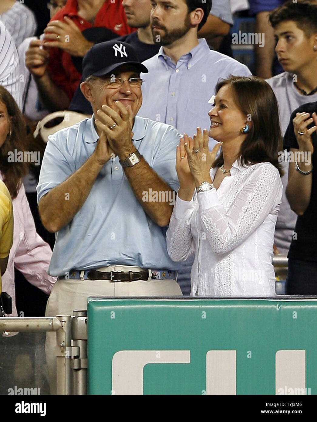 Rudi Giuliani and wife Judith Nathan stand up and applaud in the 7th ...