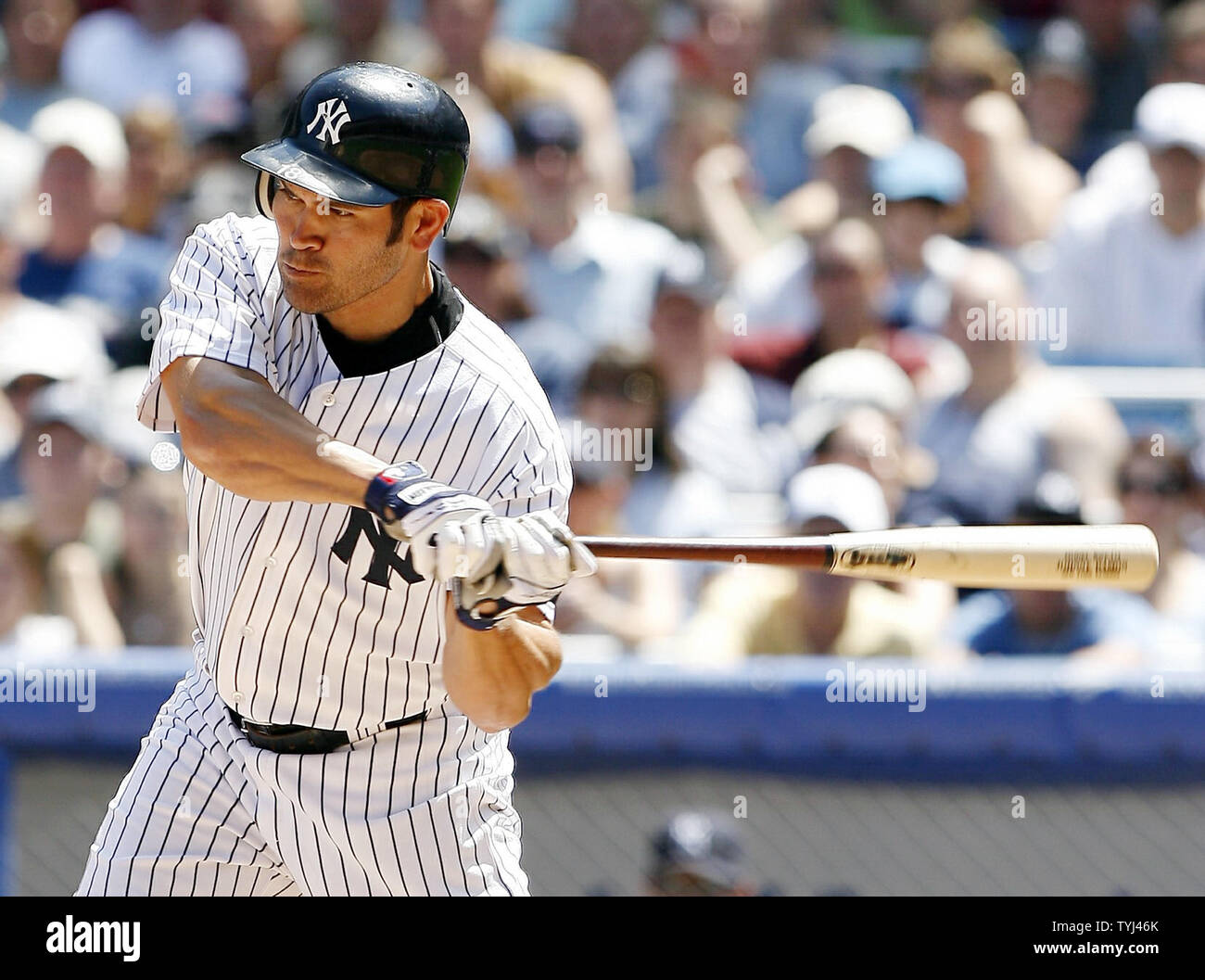 New York Yankees Johnny Damon hits a single in the sixth inning against ...