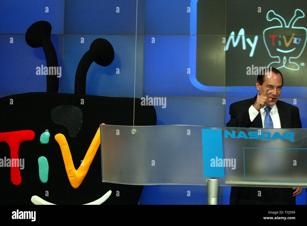 TiVo CEO Tom Rogers takes part in the opening bell ceremonies at the ...