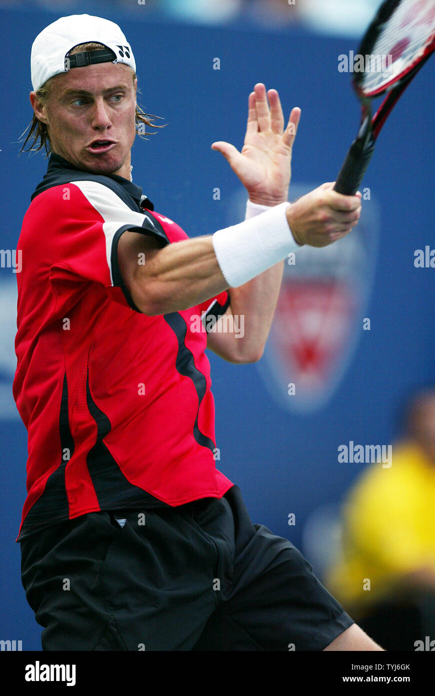 Lleyton Hewitt of Austria plays against Amer Delic of the USA during ...