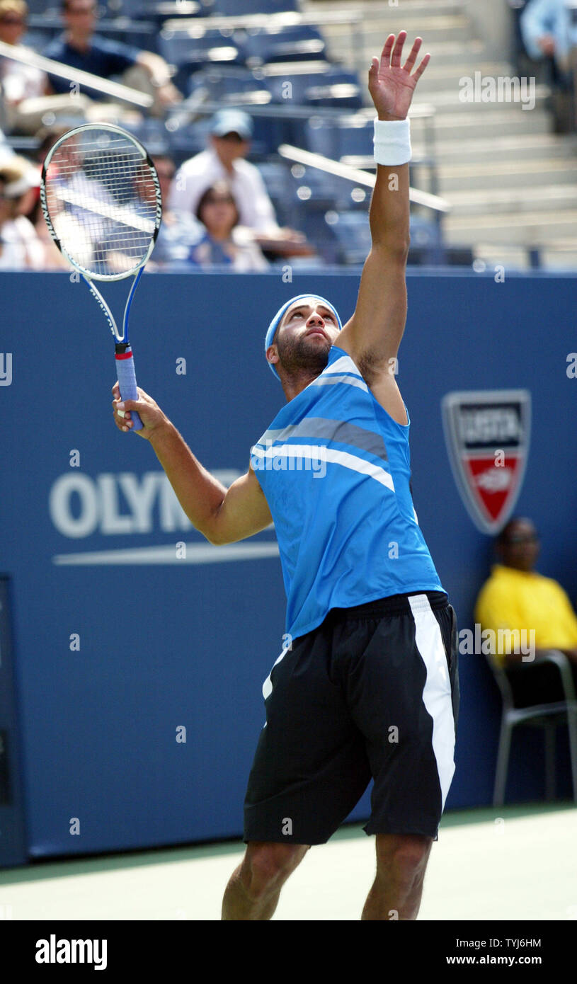 James Blake of the USA plays against Michael Russell of the USA during ...