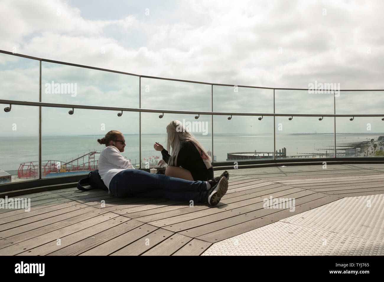 Southend on Sea, UK. 26th June, 2019. UK Weather: A couple sit down ...