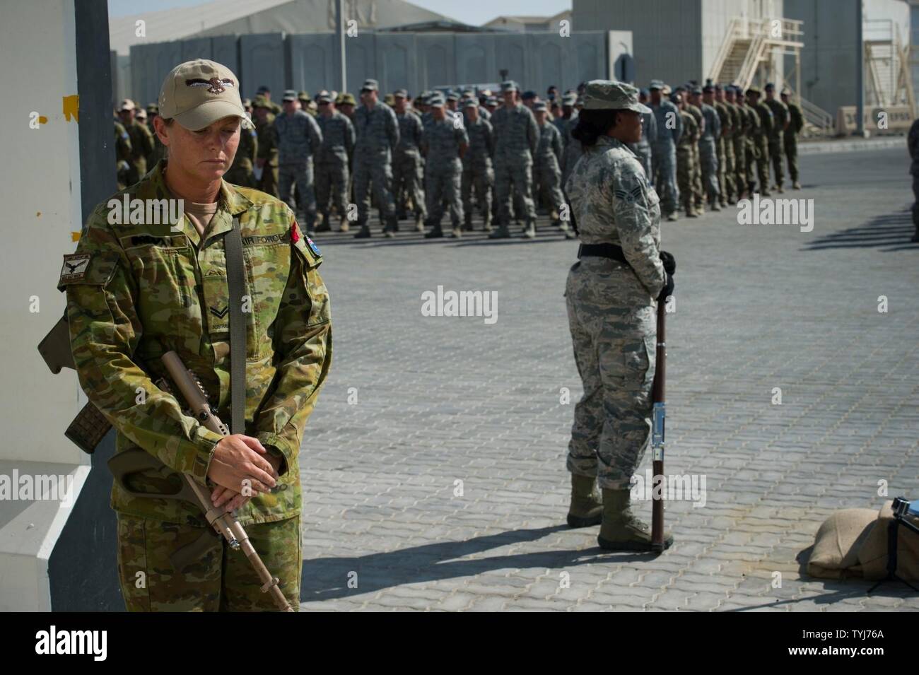 A deployed member of the Royal Australian Air Force Honor Guard stands ...