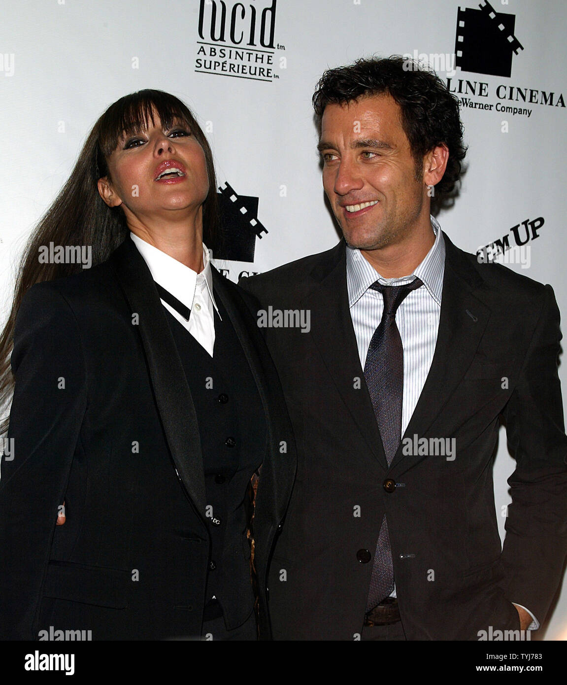 Clive Owen and Monica Bellucci arrive for the premiere of "Shoot 'Em Up ...