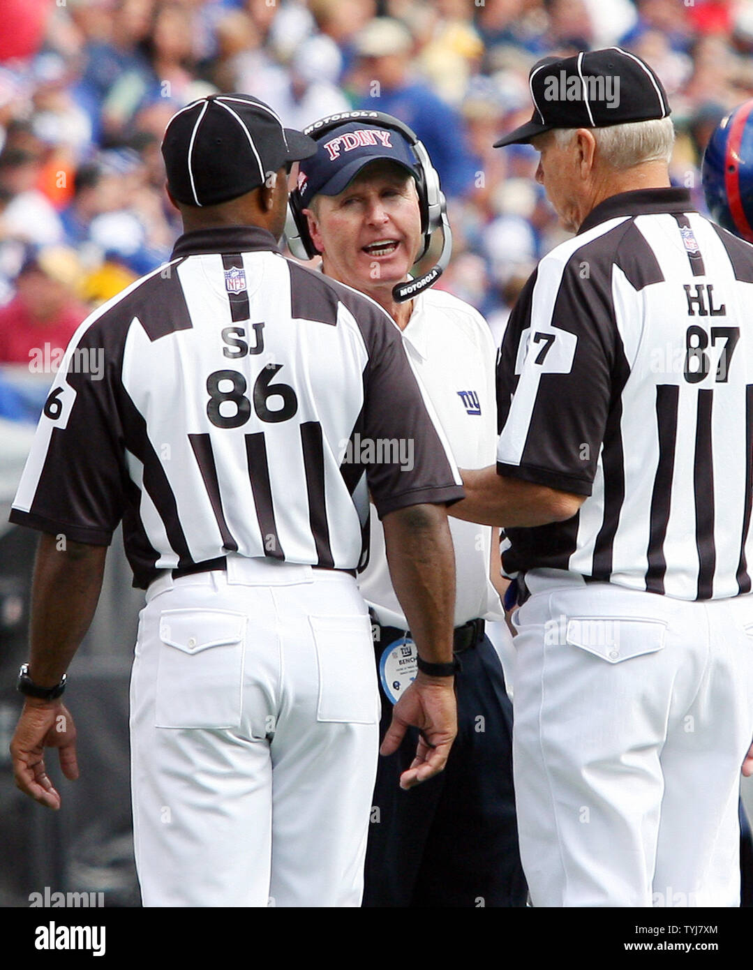 New York Giants head coach Tom Coughlin argues with officials Barry ...
