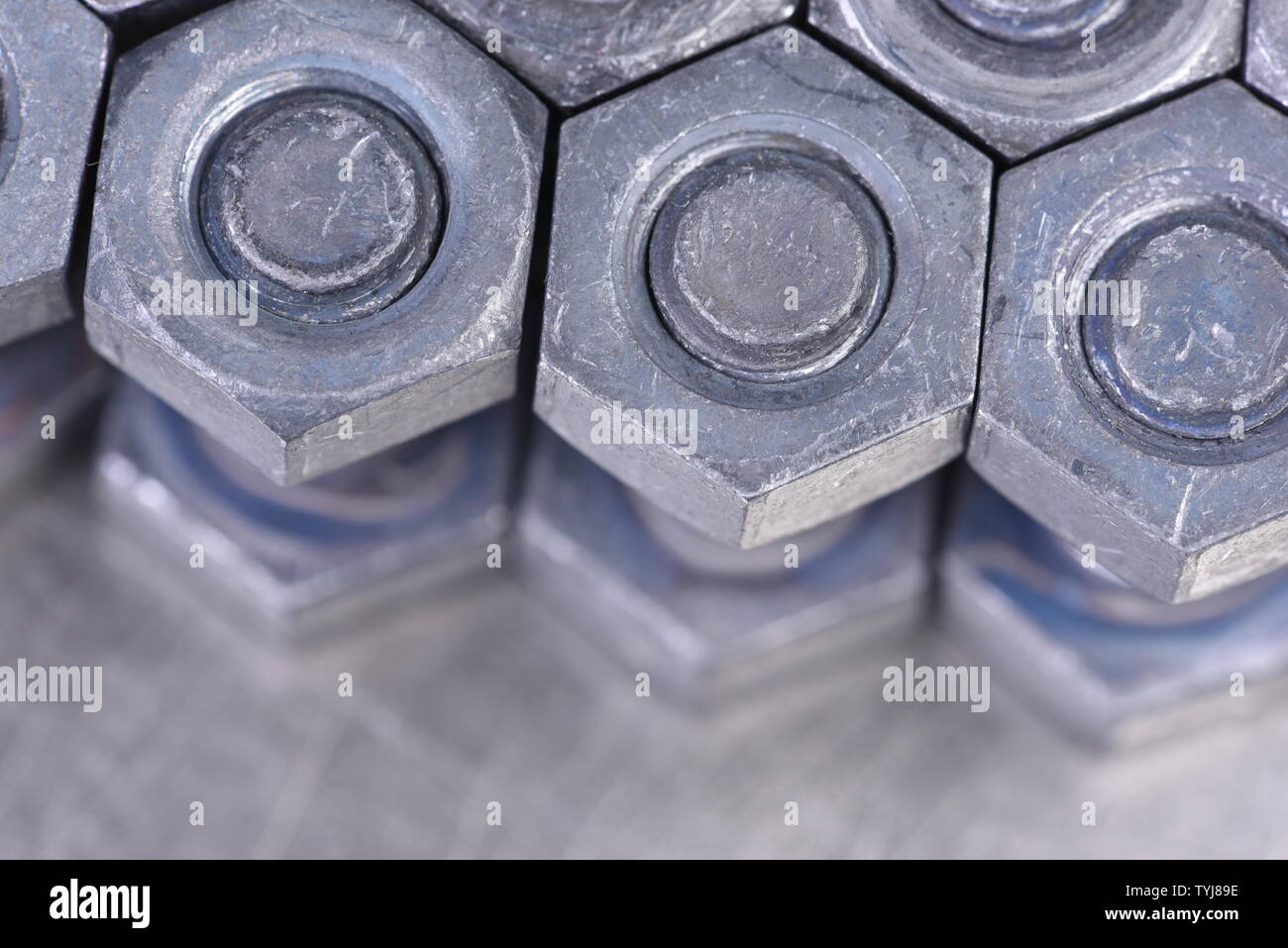 Steel bolts and nuts close-up Stock Photo - Alamy